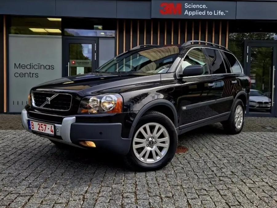 Black Volvo XC90 2005 in Riga, with an engine capacity of 2.40 L and mileage of 219 thousand km for 6190 €, photo 1 on AUTOMOTO.COM.LV