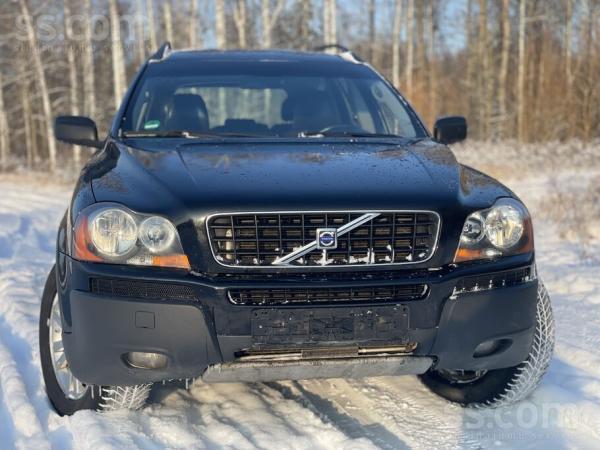 Black Volvo XC90 2006 in Riga, with an engine capacity of 2.40 L and mileage of 327 thousand km for 5750 €, photo 4 on AUTOMOTO.COM.LV