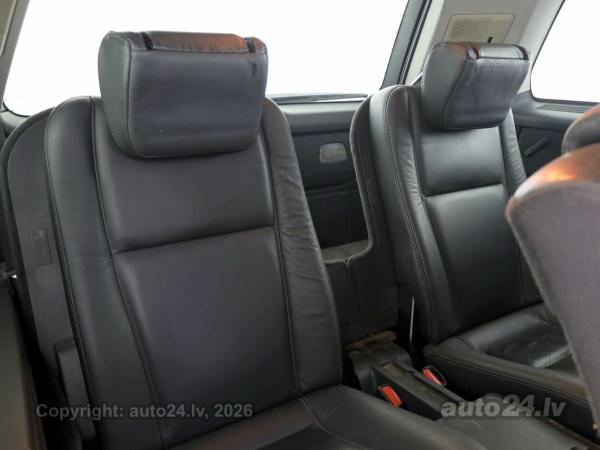 Black Volvo XC90 2006 in Tallinn, with an engine capacity of 2.40 L and mileage of 292 thousand km for 3999 €, photo 8 on AUTOMOTO.COM.LV