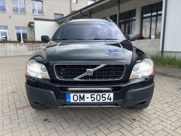 Melns Volvo XC90 2006 Rēzekne, ar dzinēja tilpumu 2.40 L un nobraukumu 385 tūkst. km par 4950 €, foto 1 vietnē AUTOMOTO.COM.LV
