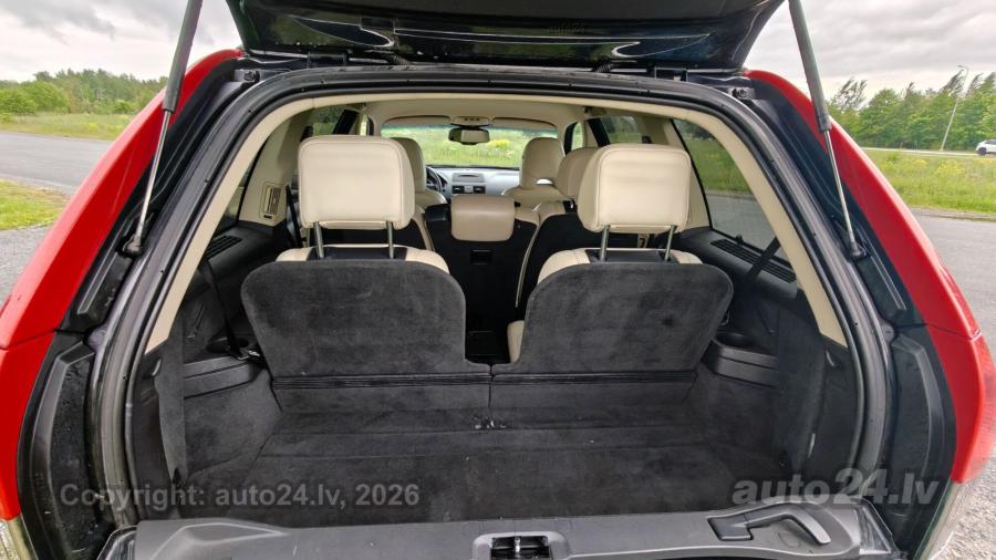 Black Volvo XC90 2006 in Maardu, with an engine capacity of 2.40 L and mileage of 263 thousand km for 6500 €, photo 7 on AUTOMOTO.COM.LV
