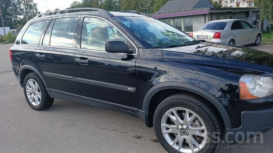 Black Volvo XC90 2006 in Riga, with an engine capacity of 2.40 L and mileage of 430 thousand km for 2100 €, photo 4 on AUTOMOTO.COM.LV
