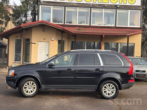 Black Volvo XC90 2007 in Riga, with an engine capacity of 2.40 L and mileage of 325 thousand km for 6450 €, photo 1 on AUTOMOTO.COM.LV