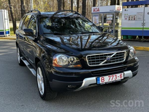 Black Volvo XC90 2007 in Riga, with an engine capacity of 2.40 L and mileage of 319 thousand km for 6399 €, photo 1 on AUTOMOTO.COM.LV