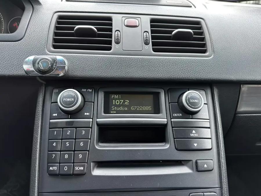 Black Volvo XC90 2007 in Riga, with an engine capacity of 2.40 L and mileage of 390 thousand km for 4490 €, photo 28 on AUTOMOTO.COM.LV