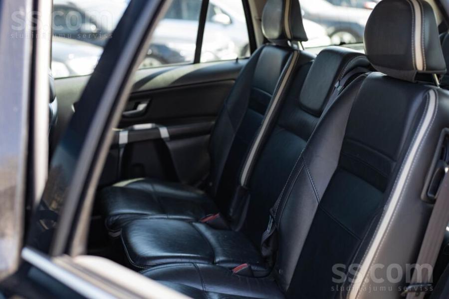 Black Volvo XC90 2008 in Riga, with an engine capacity of 2.40 L and mileage of 331 thousand km for 6790 €, photo 12 on AUTOMOTO.COM.LV