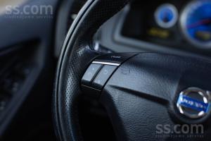 Black Volvo XC90 2008 in Riga, with an engine capacity of 2.40 L and mileage of 331 thousand km for 6790 €, photo 17 on AUTOMOTO.COM.LV
