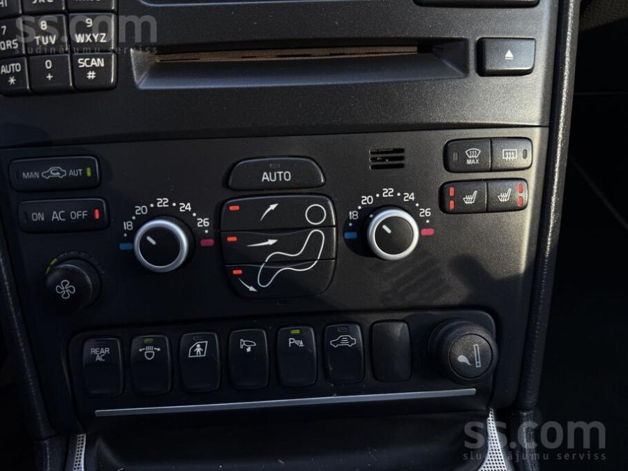 Black Volvo XC90 2008 in Riga, with an engine capacity of 2.40 L and mileage of 220 thousand km for 7990 €, photo 22 on AUTOMOTO.COM.LV
