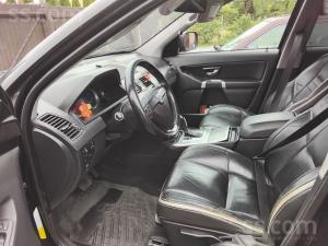 Black Volvo XC90 2008 in Riga, with an engine capacity of 2.40 L and mileage of 277 thousand km for 5550 €, photo 15 on AUTOMOTO.COM.LV