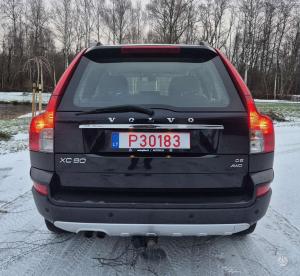 Black Volvo XC90 2010 in Utena, with an engine capacity of 2.40 L and mileage of 300 thousand km for 7250 €, photo 12 on AUTOMOTO.COM.LV