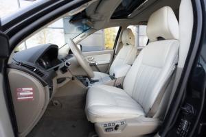 Black Volvo XC90 2010 in Riga, with an engine capacity of 2.40 L and mileage of 243 thousand km for 10500 €, photo 48 on AUTOMOTO.COM.LV