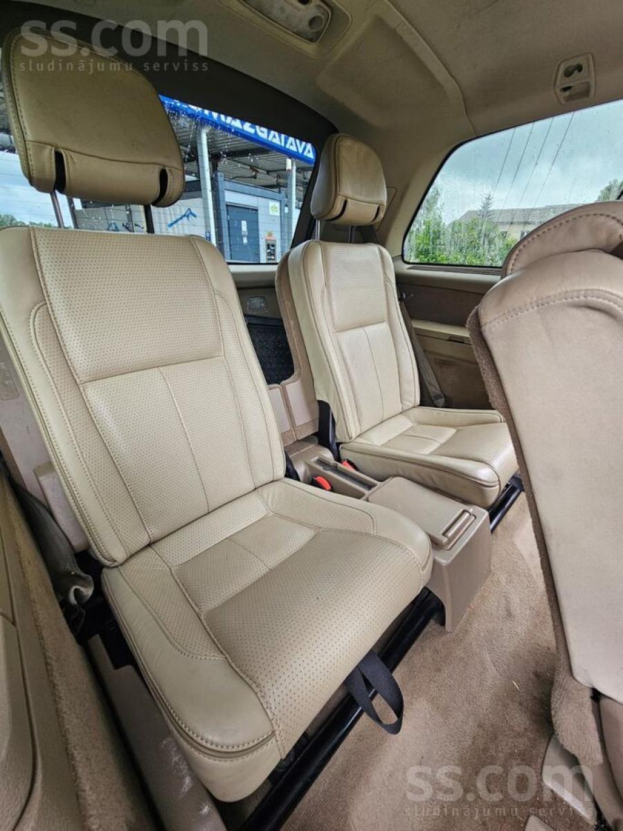 Black Volvo XC90 2010 in Cesis, with an engine capacity of 2.40 L and mileage of 312 thousand km for 8995 €, photo 14 on AUTOMOTO.COM.LV