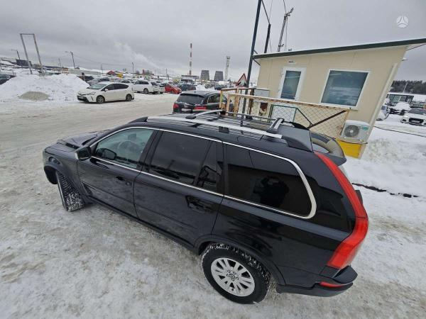 Black Volvo XC90 2011 in Vilnius, with an engine capacity of 2.40 L and mileage of 266 thousand km for 8700 €, photo 7 on AUTOMOTO.COM.LV