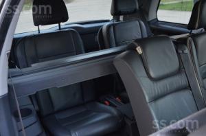 Black Volvo XC90 2011 in Riga, with an engine capacity of 2.40 L and mileage of 285 thousand km for 10990 €, photo 22 on AUTOMOTO.COM.LV