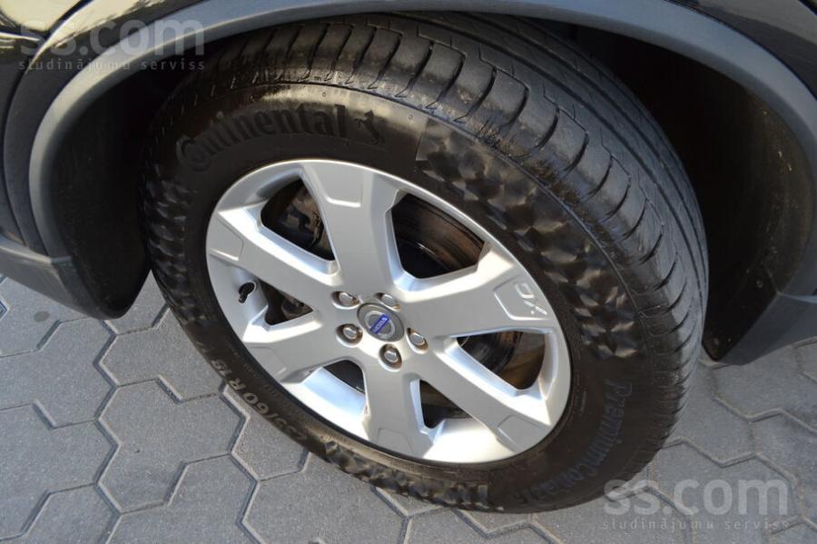 Black Volvo XC90 2011 in Riga, with an engine capacity of 2.40 L and mileage of 288 thousand km for 9390 €, photo 36 on AUTOMOTO.COM.LV