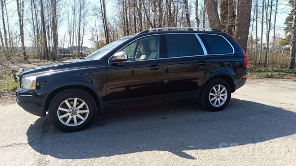 Black Volvo XC90 2011 in Riga, with an engine capacity of 2.40 L and mileage of 313 thousand km for 7800 €, photo 7 on AUTOMOTO.COM.LV