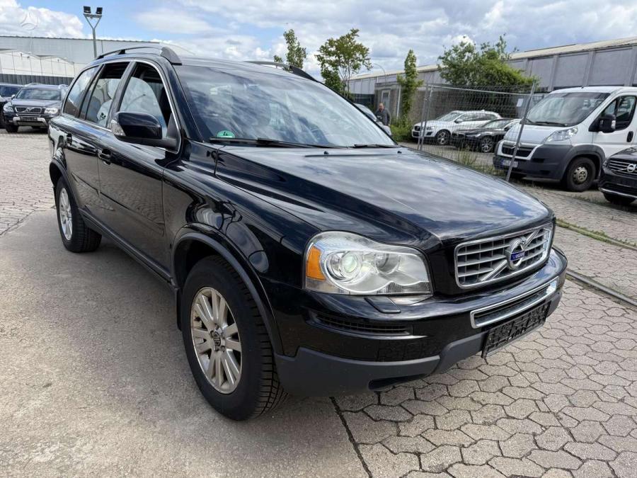 Black Volvo XC90 2011 in Marijampole, with an engine capacity of 2.40 L and mileage of 235 thousand km for 9499 €, photo 1 on AUTOMOTO.COM.LV