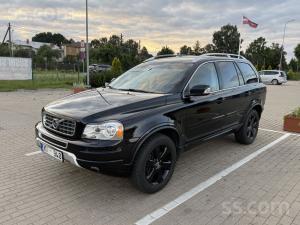 Black Volvo XC90 2011 in Riga, with an engine capacity of 2.40 L and mileage of 290 thousand km for 10600 €, photo 5 on AUTOMOTO.COM.LV