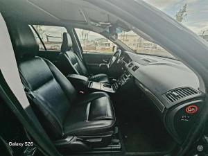 Black Volvo XC90 2011 in Vilnius, with an engine capacity of 2.40 L and mileage of 312 thousand km for 10950 €, photo 12 on AUTOMOTO.COM.LV