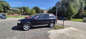 Black Volvo XC90 2011 in Riga, with an engine capacity of 2.40 L and mileage of 352 thousand km for 10600 €, photo 4 on AUTOMOTO.COM.LV