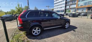 Black Volvo XC90 2011 in Riga, with an engine capacity of 2.40 L and mileage of 352 thousand km for 10600 €, photo 5 on AUTOMOTO.COM.LV