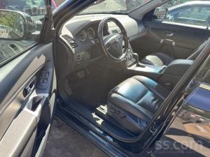 Black Volvo XC90 2012 in Riga, with an engine capacity of 2.40 L and mileage of 210 thousand km for 11900 €, photo 5 on AUTOMOTO.COM.LV
