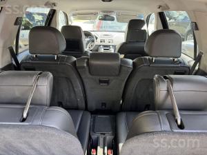 Black Volvo XC90 2012 in Riga, with an engine capacity of 2.40 L and mileage of 210 thousand km for 11900 €, photo 7 on AUTOMOTO.COM.LV