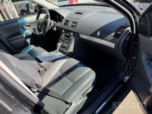 Black Volvo XC90 2012 in Riga, with an engine capacity of 2.40 L and mileage of 210 thousand km for 11900 €, photo 10 on AUTOMOTO.COM.LV