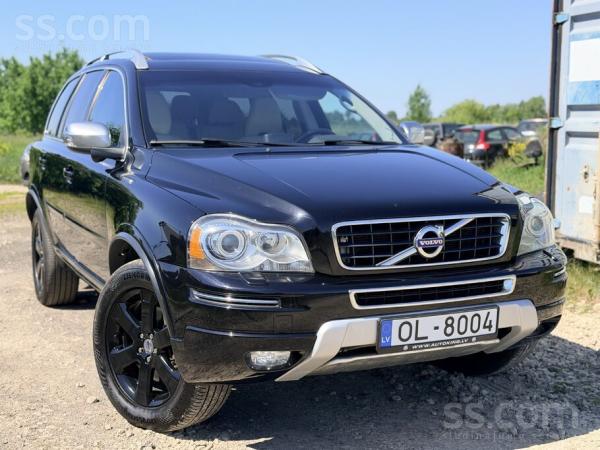 Black Volvo XC90 2012 in Riga, with an engine capacity of 2.40 L and mileage of 305 thousand km for 9995 €, photo 1 on AUTOMOTO.COM.LV