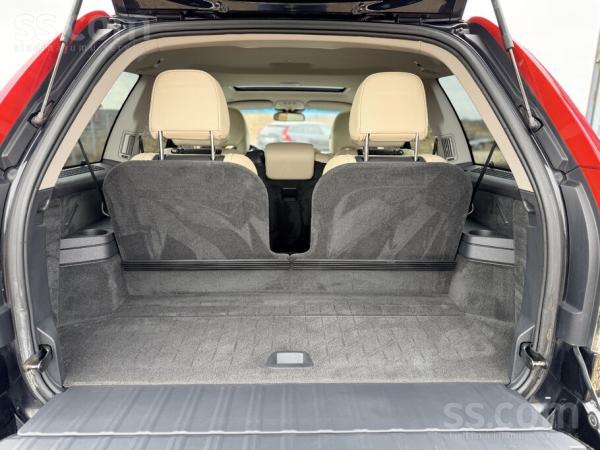 Black Volvo XC90 2012 in Riga, with an engine capacity of 2.40 L and mileage of 305 thousand km for 9995 €, photo 5 on AUTOMOTO.COM.LV