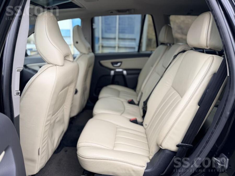Black Volvo XC90 2012 in Riga, with an engine capacity of 2.40 L and mileage of 305 thousand km for 9995 €, photo 7 on AUTOMOTO.COM.LV