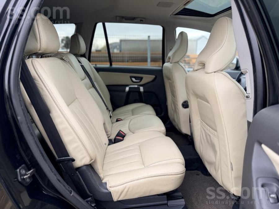 Black Volvo XC90 2012 in Riga, with an engine capacity of 2.40 L and mileage of 305 thousand km for 9995 €, photo 16 on AUTOMOTO.COM.LV