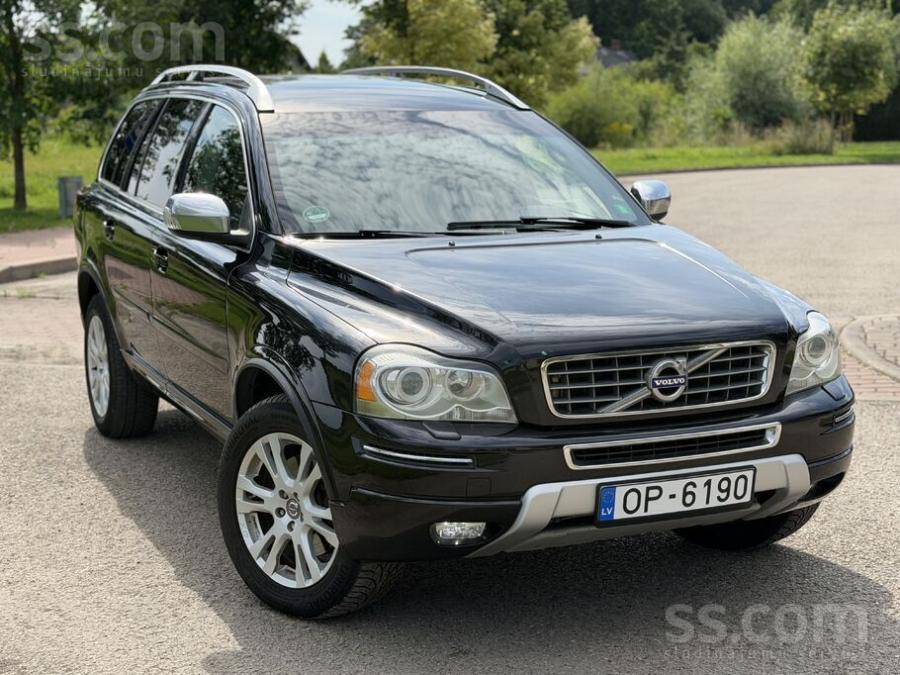 Black Volvo XC90 2012 in Aizkraukle, with an engine capacity of 2.40 L and mileage of 303 thousand km for 9880 €, photo 1 on AUTOMOTO.COM.LV