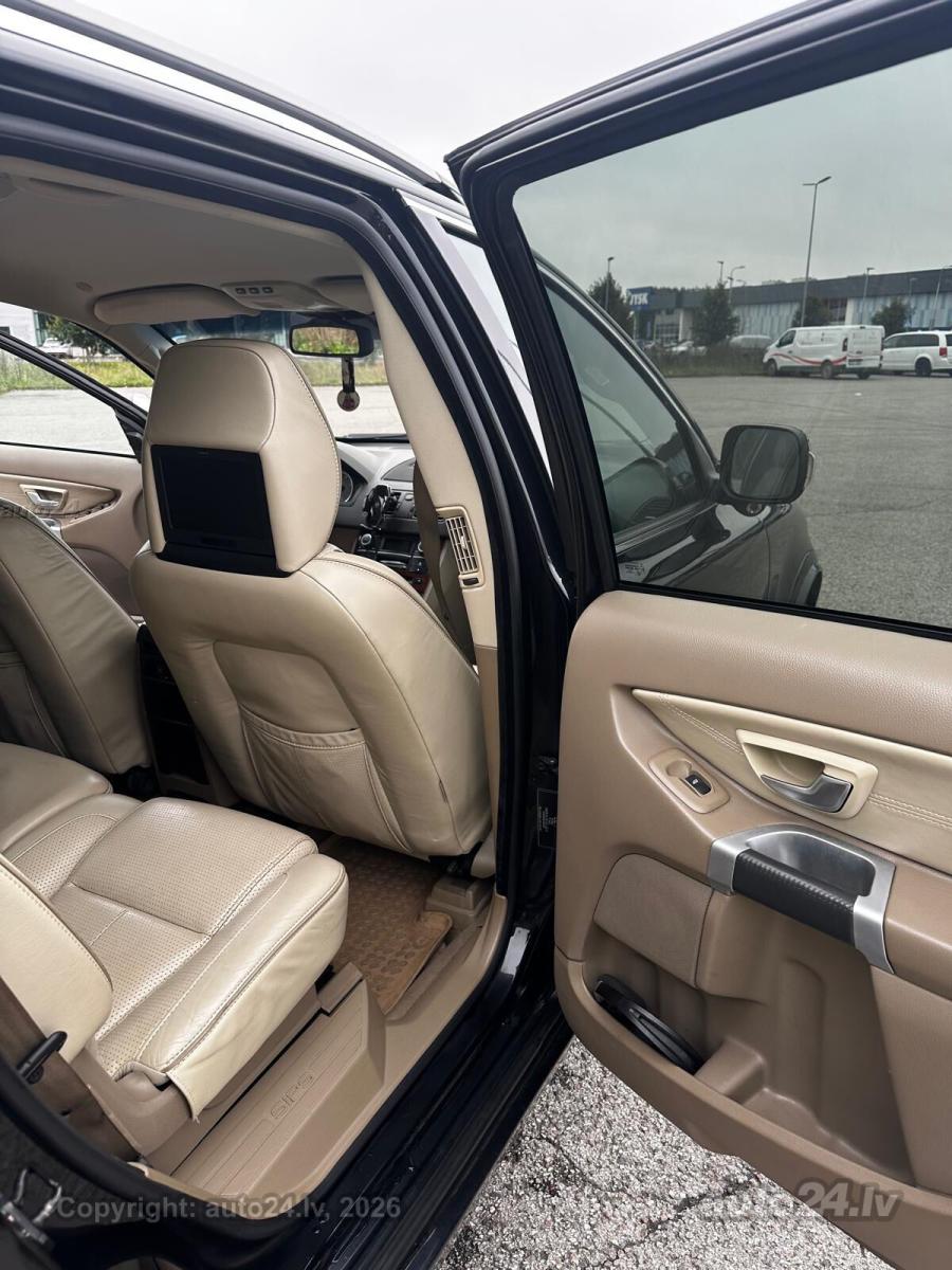 Black Volvo XC90 2012 in Tallinn, with an engine capacity of 2.40 L and mileage of 228 thousand km for 10499 €, photo 22 on AUTOMOTO.COM.LV