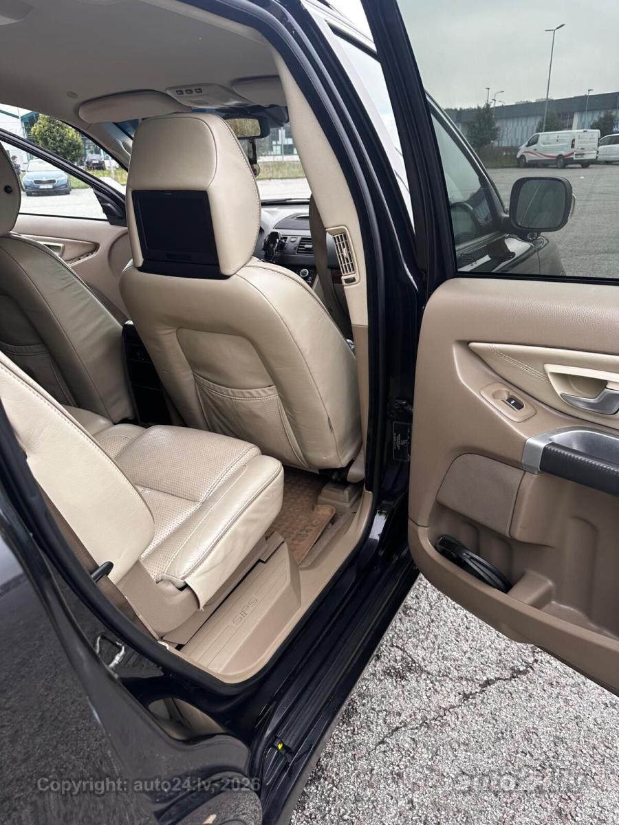 Black Volvo XC90 2012 in Tallinn, with an engine capacity of 2.40 L and mileage of 228 thousand km for 10499 €, photo 23 on AUTOMOTO.COM.LV