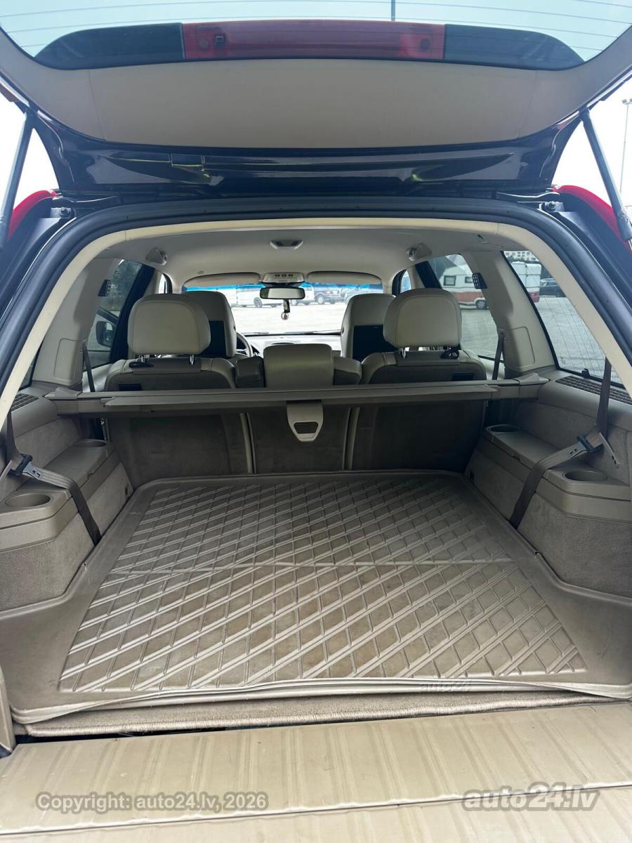 Black Volvo XC90 2012 in Tallinn, with an engine capacity of 2.40 L and mileage of 228 thousand km for 10499 €, photo 26 on AUTOMOTO.COM.LV