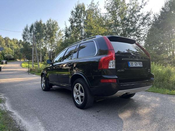 Black Volvo XC90 2013 in Vilnius, with an engine capacity of 2.40 L and mileage of 248 thousand km for 13000 €, photo 6 on AUTOMOTO.COM.LV