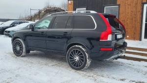 Black Volvo XC90 2014 in Riga, with an engine capacity of 2.40 L and mileage of 200 thousand km for 13990 €, photo 16 on AUTOMOTO.COM.LV