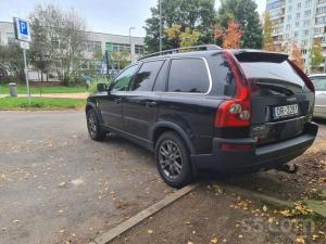 Melns Volvo XC90 2004 Rīga, ar dzinēja tilpumu 2.40 L un nobraukumu 450 tūkst. km par 3099 €, foto  vietnē AUTOMOTO.COM.LV