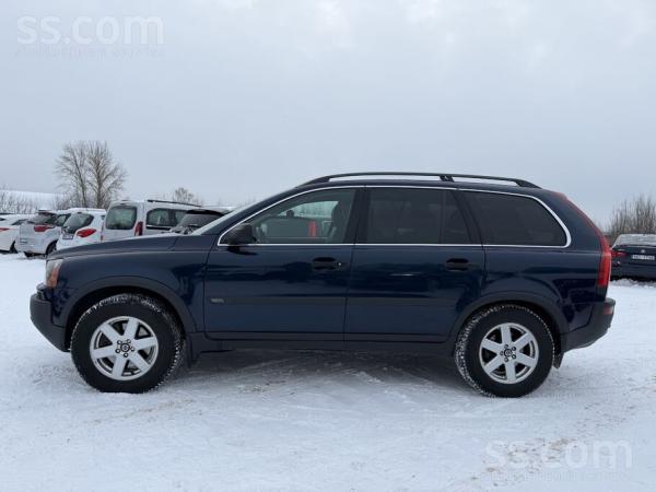 Blue Volvo XC90 2004 in Daugavpils, with an engine capacity of 2.40 L and mileage of 302 thousand km for 4250 €, photo 5 on AUTOMOTO.COM.LV