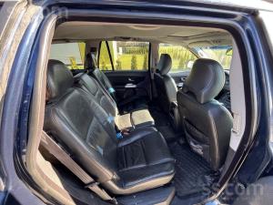 Blue Volvo XC90 2004 in Riga, with an engine capacity of 2.40 L and mileage of 395 thousand km for 2100 €, photo 6 on AUTOMOTO.COM.LV