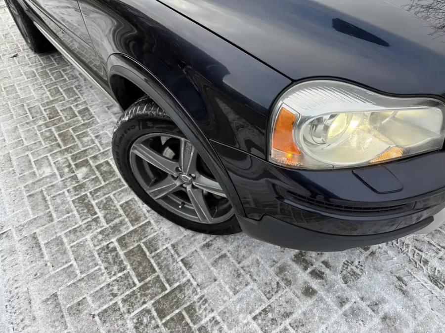 Blue Volvo XC90 2007 in Riga, with an engine capacity of 2.40 L and mileage of 284 thousand km for 5290 €, photo 3 on AUTOMOTO.COM.LV