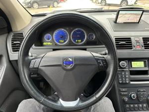 Blue Volvo XC90 2007 in Riga, with an engine capacity of 2.40 L and mileage of 284 thousand km for 5290 €, photo 23 on AUTOMOTO.COM.LV