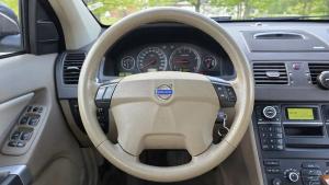 Blue Volvo XC90 2009 in Riga, with an engine capacity of 2.40 L and mileage of 381 thousand km for 5950 €, photo 16 on AUTOMOTO.COM.LV