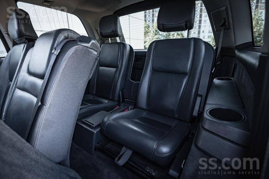 Blue Volvo XC90 2009 in Riga, with an engine capacity of 2.40 L and mileage of 300 thousand km for 5990 €, photo 14 on AUTOMOTO.COM.LV