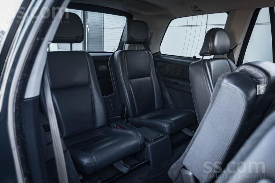 Blue Volvo XC90 2009 in Riga, with an engine capacity of 2.40 L and mileage of 300 thousand km for 5990 €, photo 15 on AUTOMOTO.COM.LV