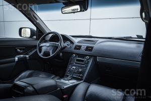 Blue Volvo XC90 2009 in Riga, with an engine capacity of 2.40 L and mileage of 300 thousand km for 5990 €, photo 16 on AUTOMOTO.COM.LV