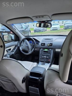 Blue Volvo XC90 2010 in Riga, with an engine capacity of 2.40 L and mileage of 246 thousand km for 7700 €, photo 8 on AUTOMOTO.COM.LV