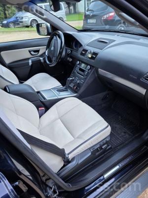 Blue Volvo XC90 2010 in Riga, with an engine capacity of 2.40 L and mileage of 246 thousand km for 7700 €, photo 13 on AUTOMOTO.COM.LV