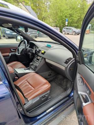 Blue Volvo XC90 2013 in Riga, with an engine capacity of 2.40 L and mileage of 416 thousand km for 10000 €, photo 4 on AUTOMOTO.COM.LV